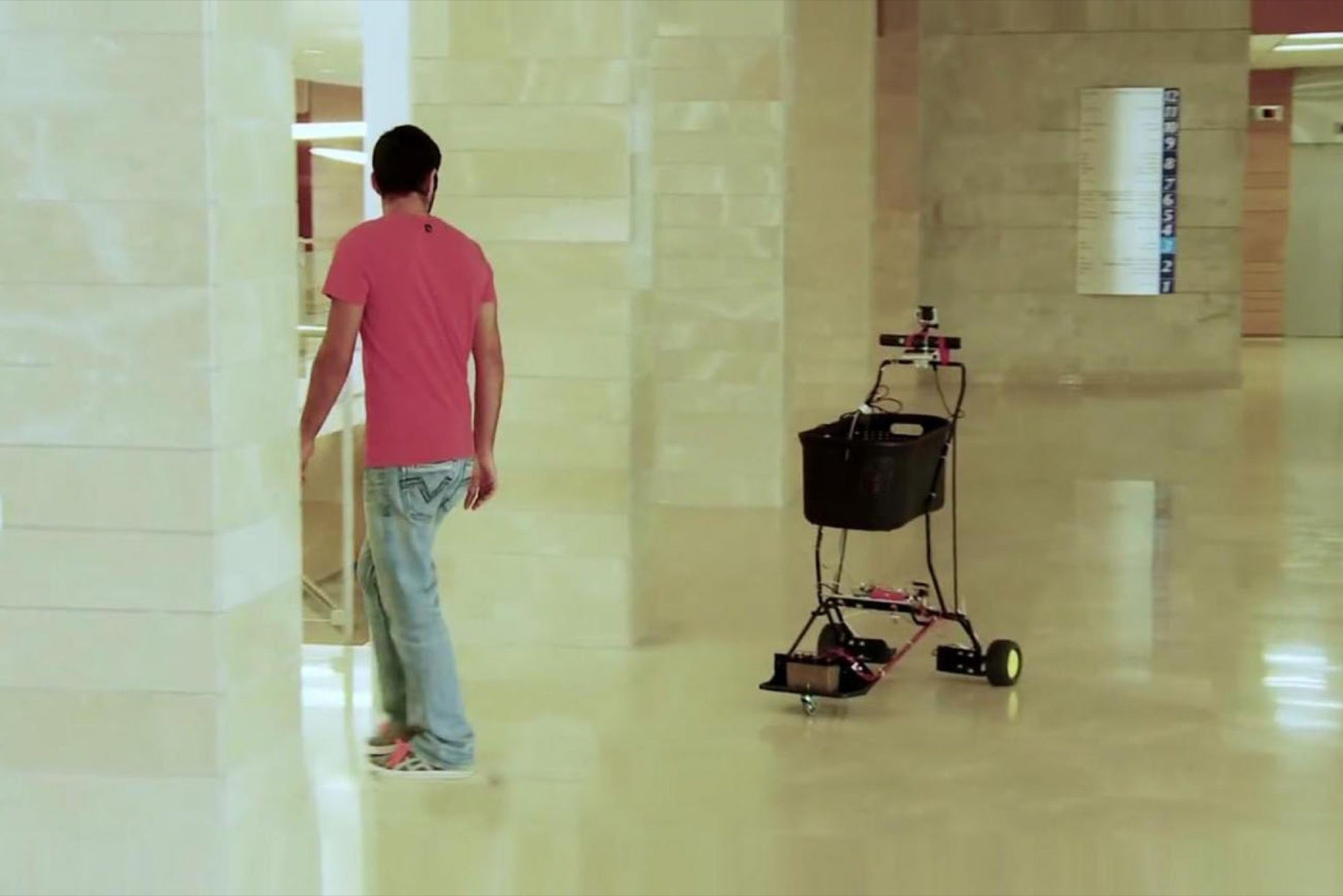 This Shopping Cart of the Future Creepily Follows You Around Stores ...