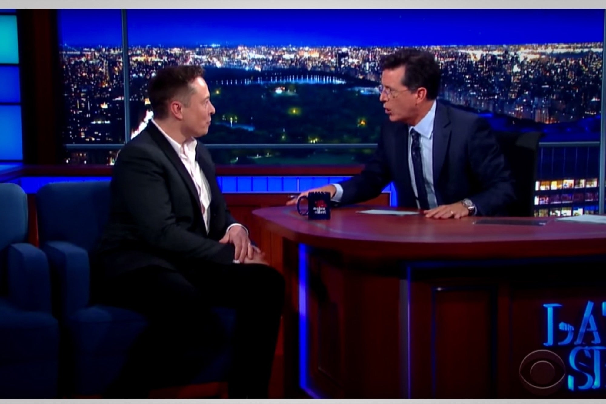 Stephen Colbert Tries to Figure Out if Elon Musk Is a Superhero or ...