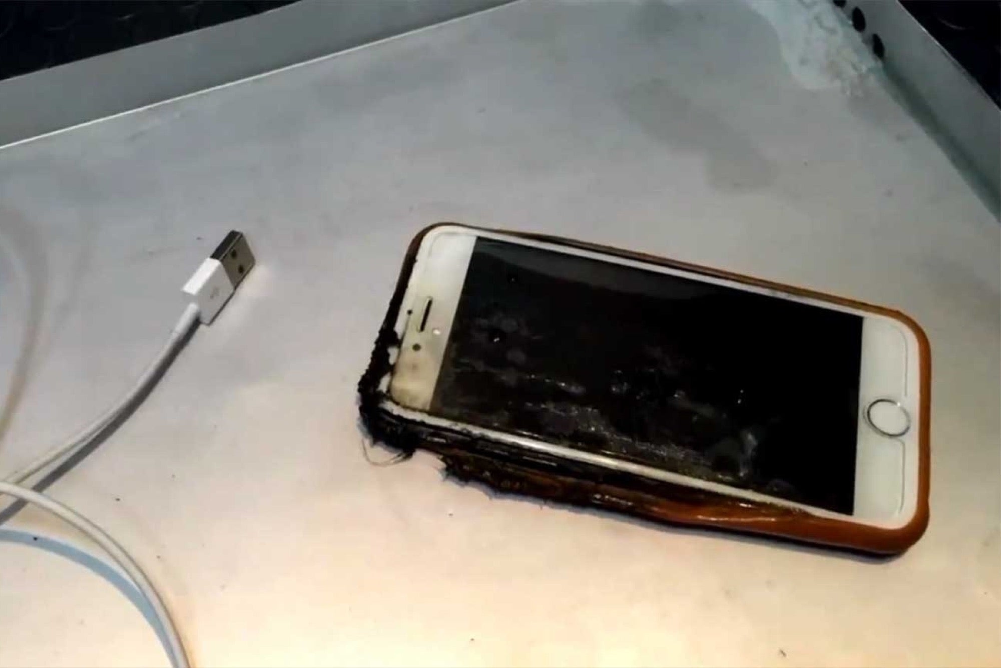 Report: iPhone Catches Fire Mid-Flight | Entrepreneur